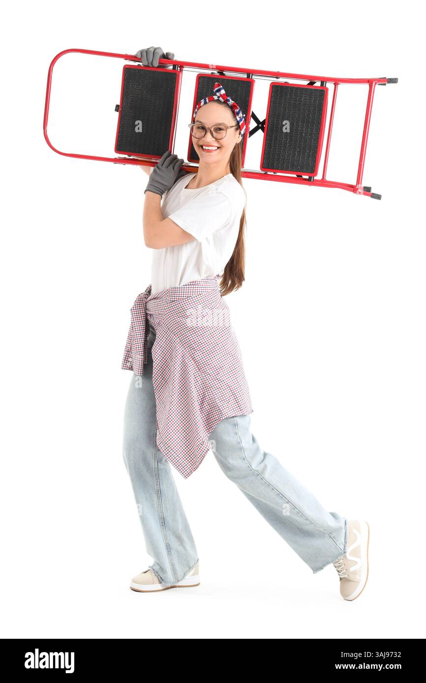 Young woman carrying stepladder on white background Stock Photo - Alamy