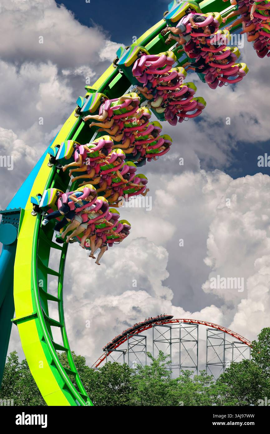 Roller Coaster Rides at Theme Park Stock Photo - Alamy
