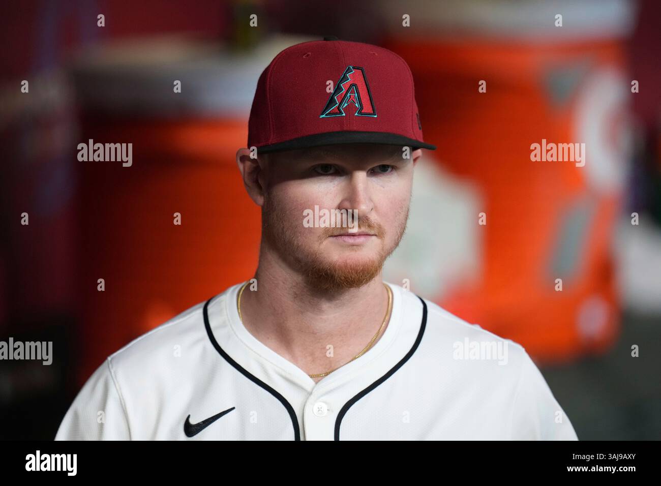 Arizona Diamondbacks' Pavin Smith walks through the dugout prior to a ...
