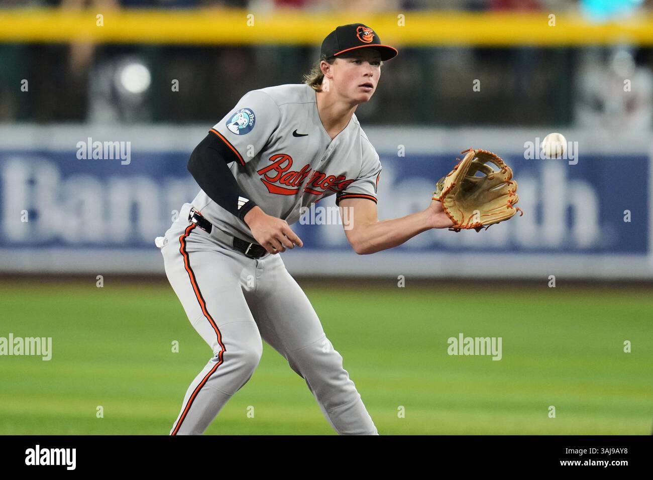 Baltimore Orioles second baseman Jackson Holliday takes a practice ...