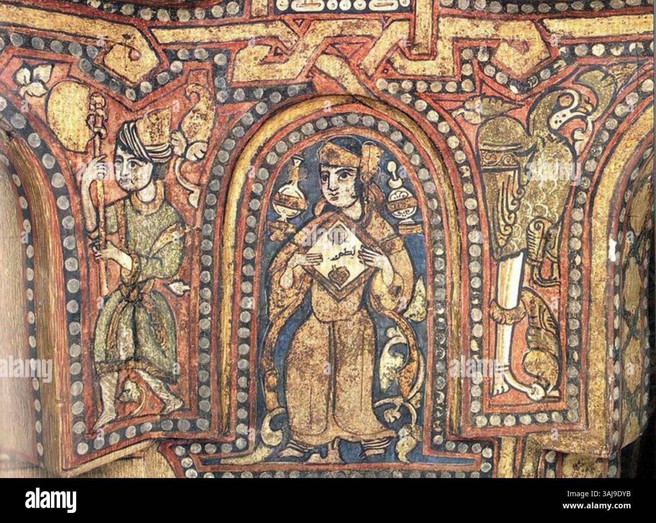 A female musician is shown playing the adufe, a traditional instrument ...