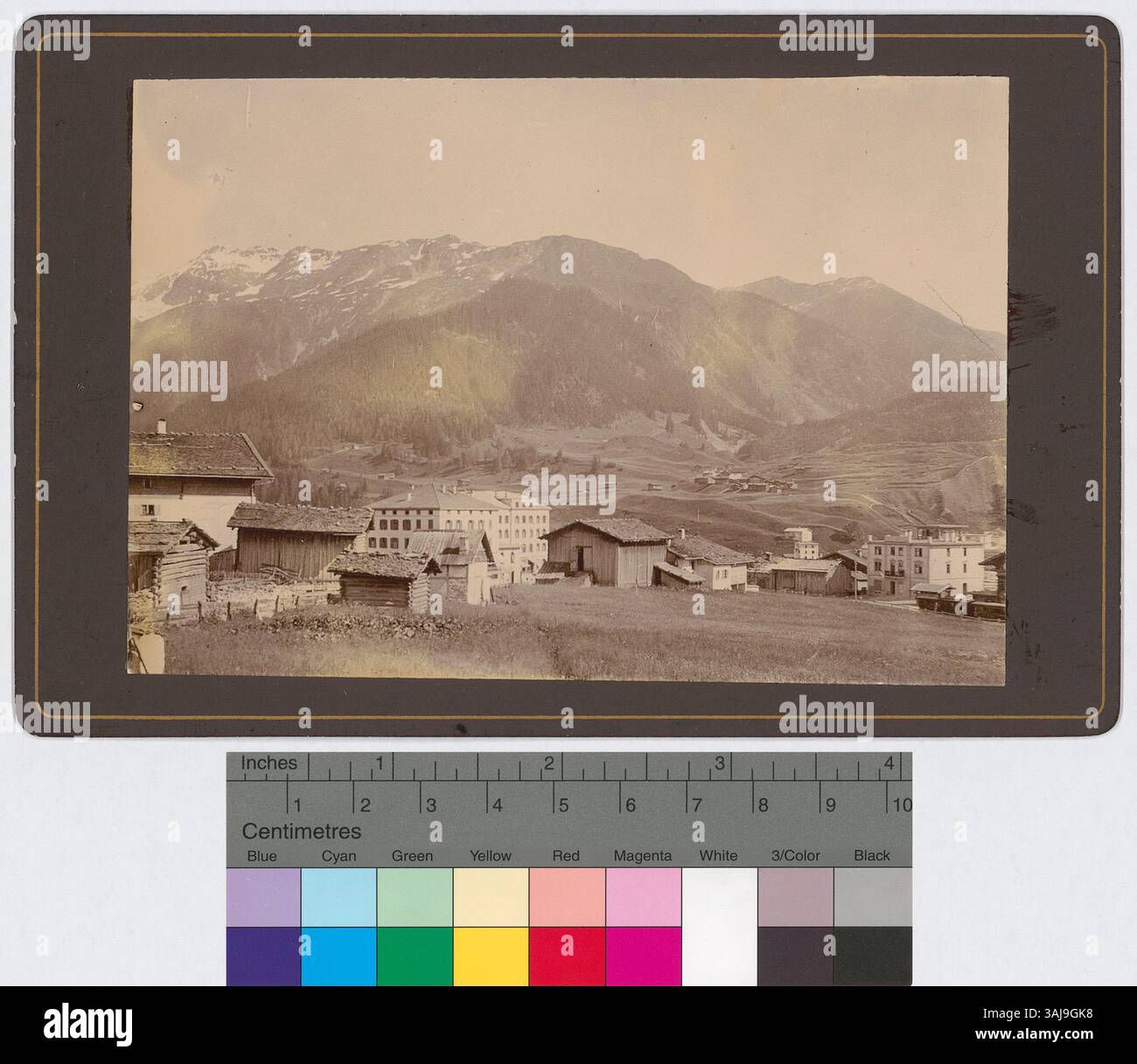 This circa 1890 view shows a Swiss village with houses and hotels, a ...