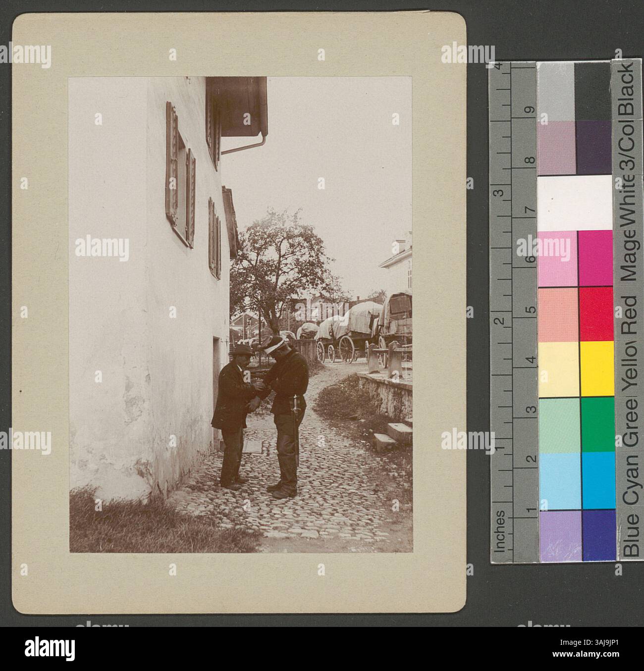 This photograph, taken between 1886 and 1910, shows a soldier and a man ...