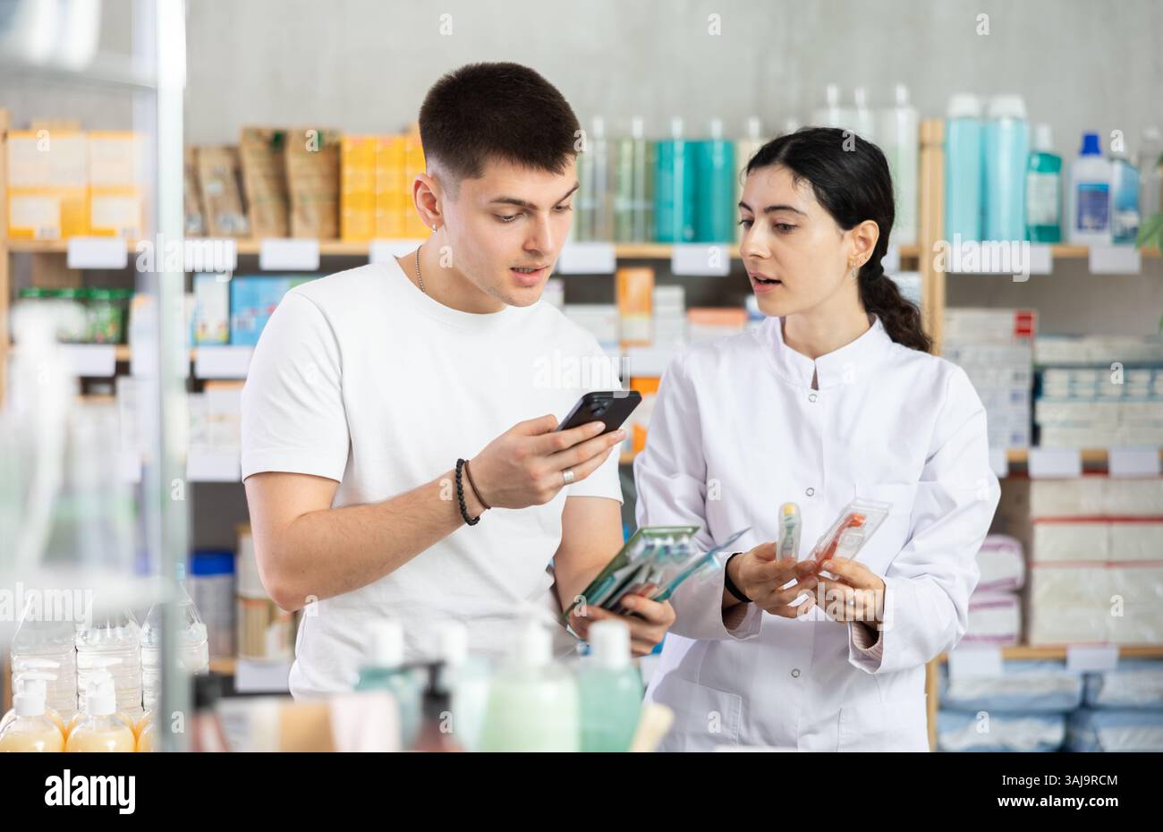 Man scans QR code on toothbrush label. Female pharmacist offers to ...