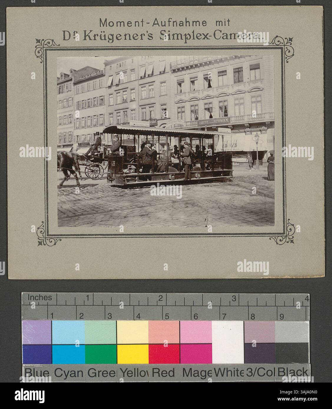 This photograph shows an open tramcar numbered '46', drawn by a horse ...