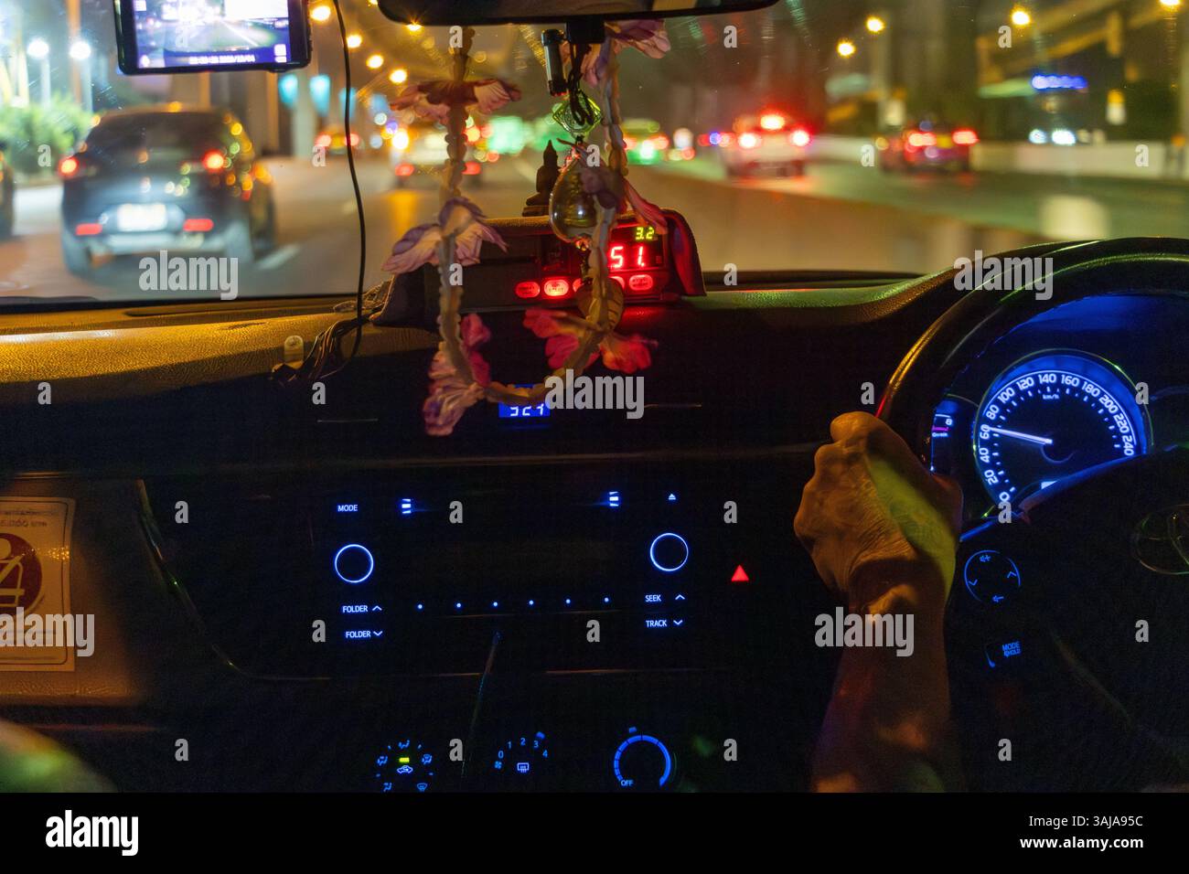 View through the windshield of a taxi car driving in the night city Stock Photo - Alamy