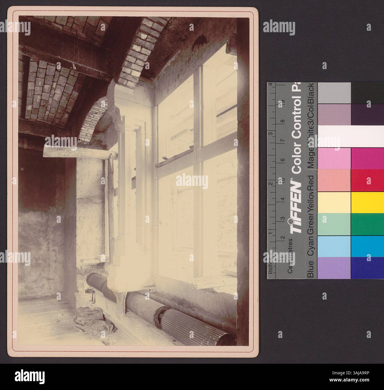 Photograph from 1900 showing a window pillar with a roller shutter at ...