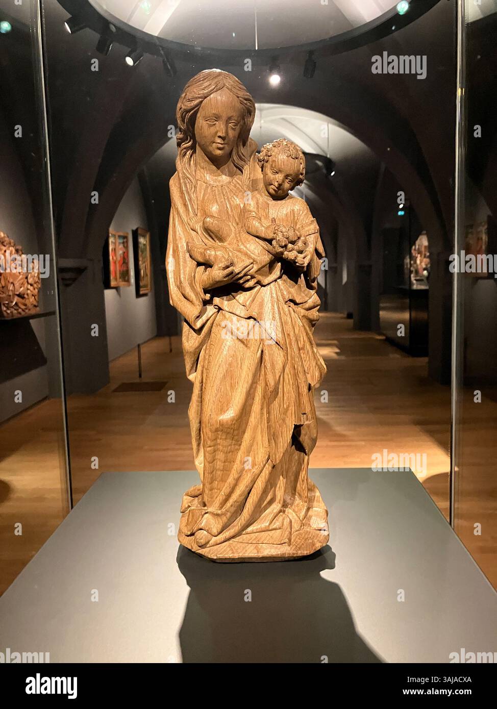 This 15th-century sculpture by Adriaen van Wesel depicts the Virgin ...