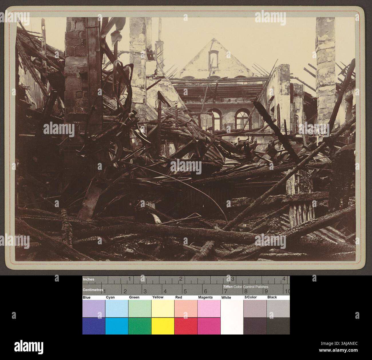 The image depicts the ruins of the Zurich theater following the fire of ...