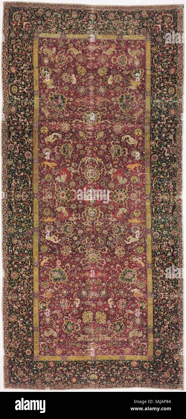 This 16th-century Persian carpet features mirrored animal combat scenes ...