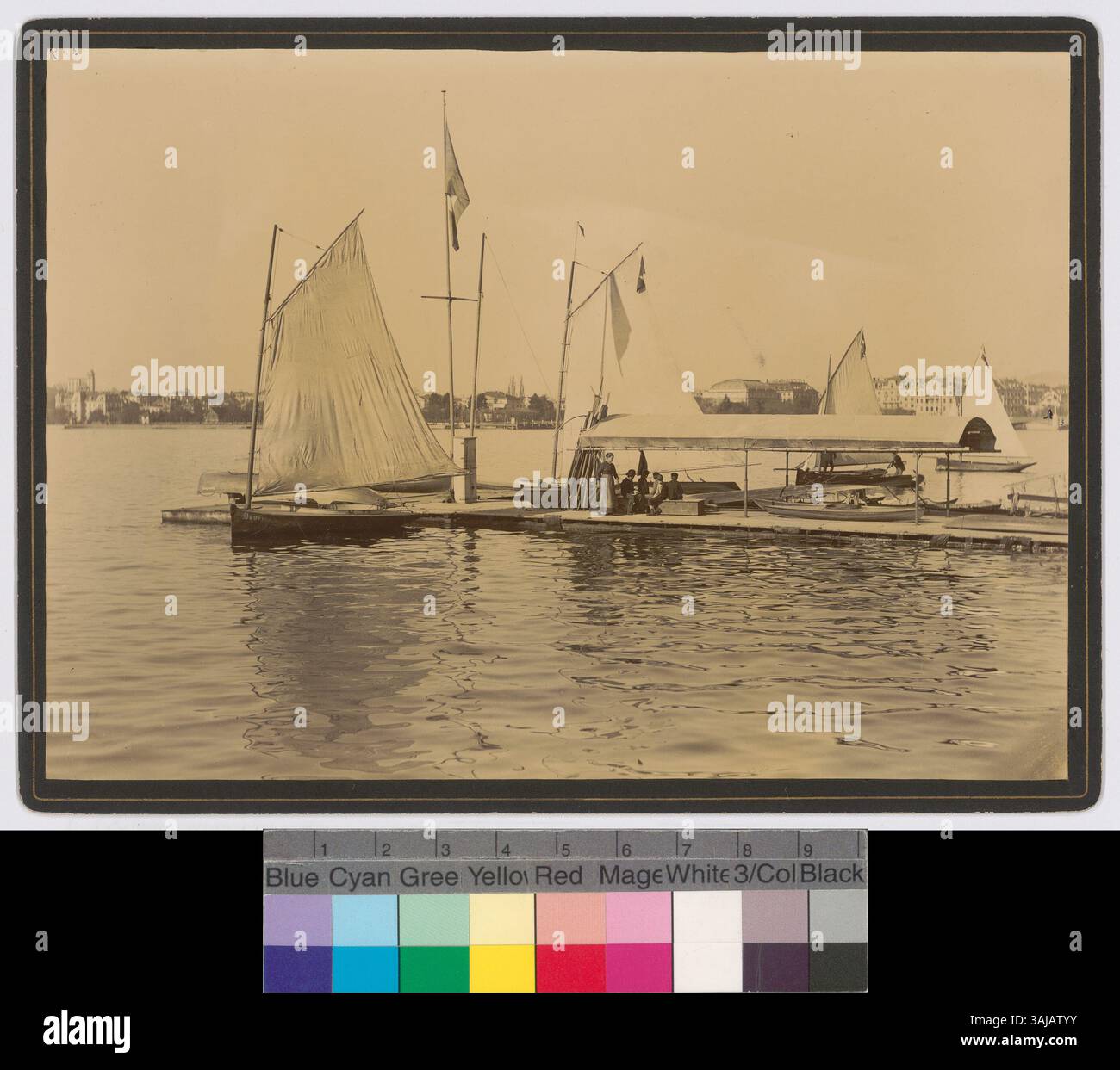 This 1889 photograph by Robert Breitinger shows a wooden dock with ...