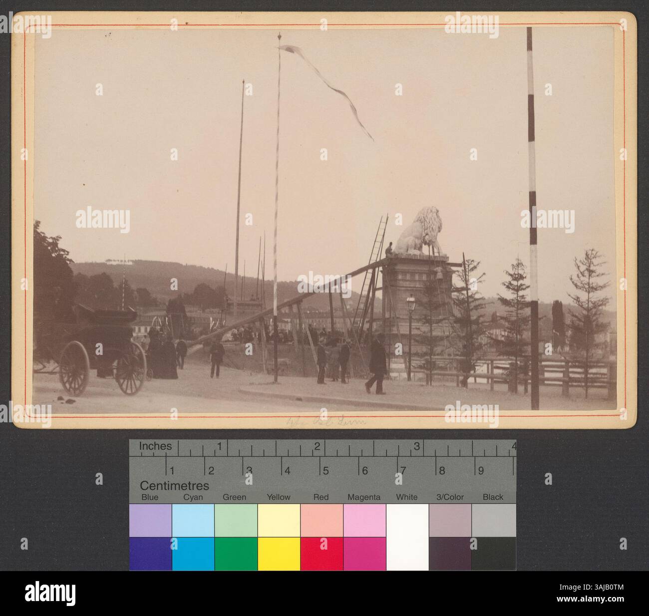 This photograph shows the placement of the first lion statue on a ...