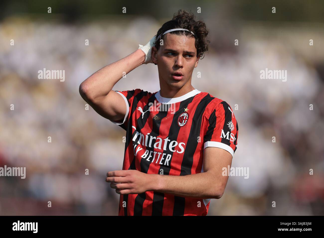 Milan, Italy, 9th April 2025. Matteo Dutu of AC Milan reacts during the ...