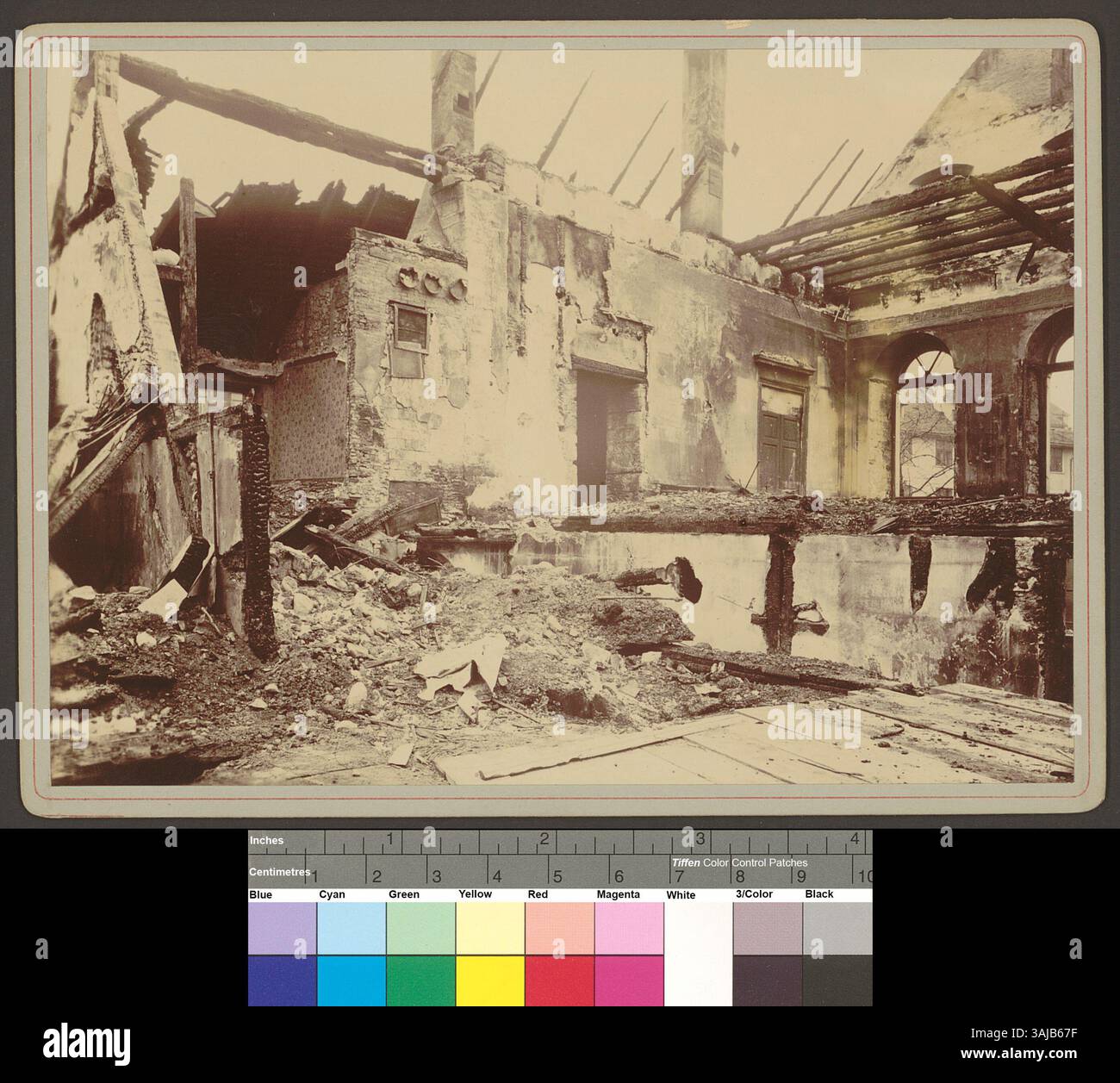 This photograph depicts the foyer of the Zürich theater after the fire ...