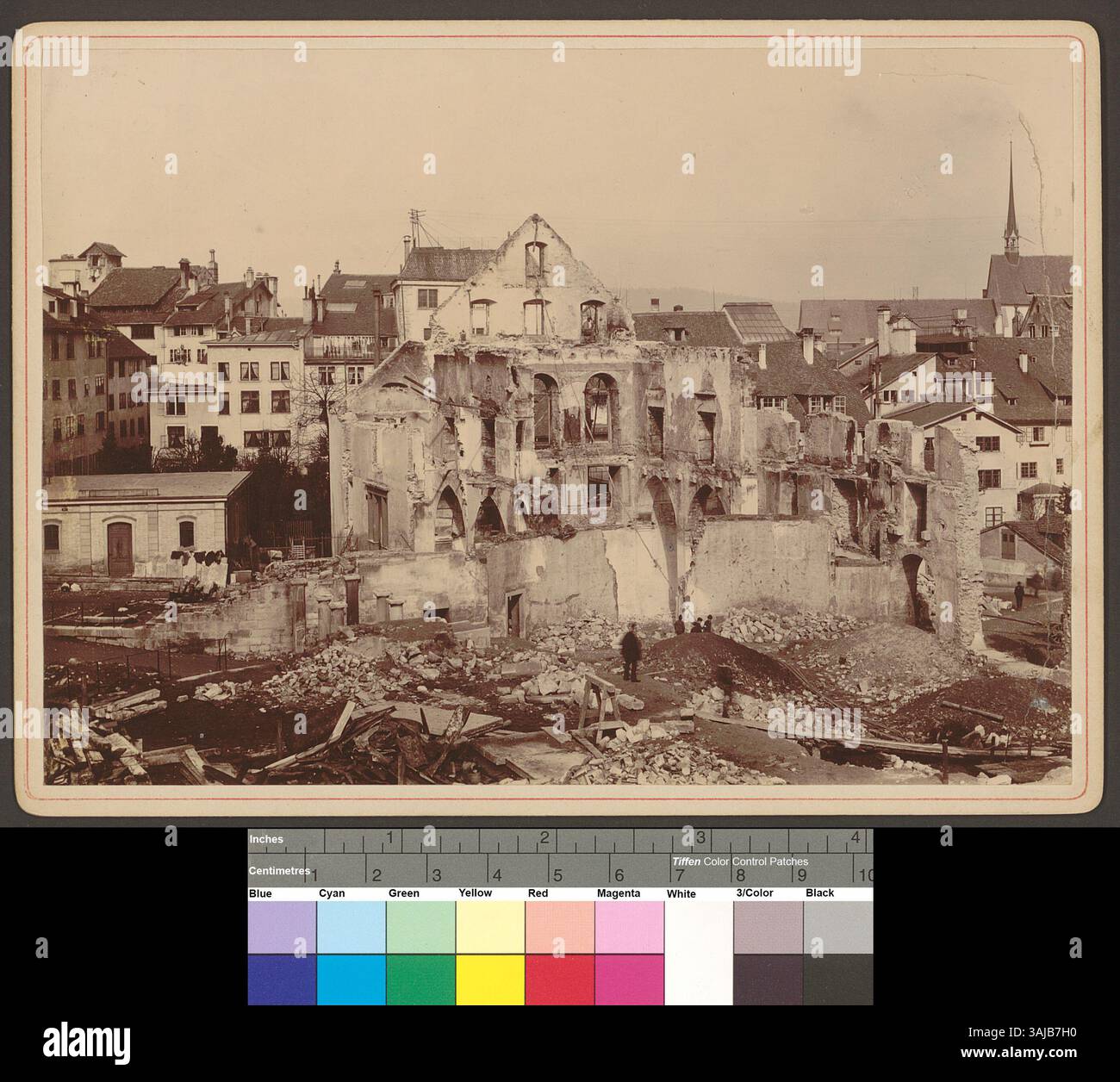 A dramatic photograph of the aftermath of a theater fire in Zürich ...