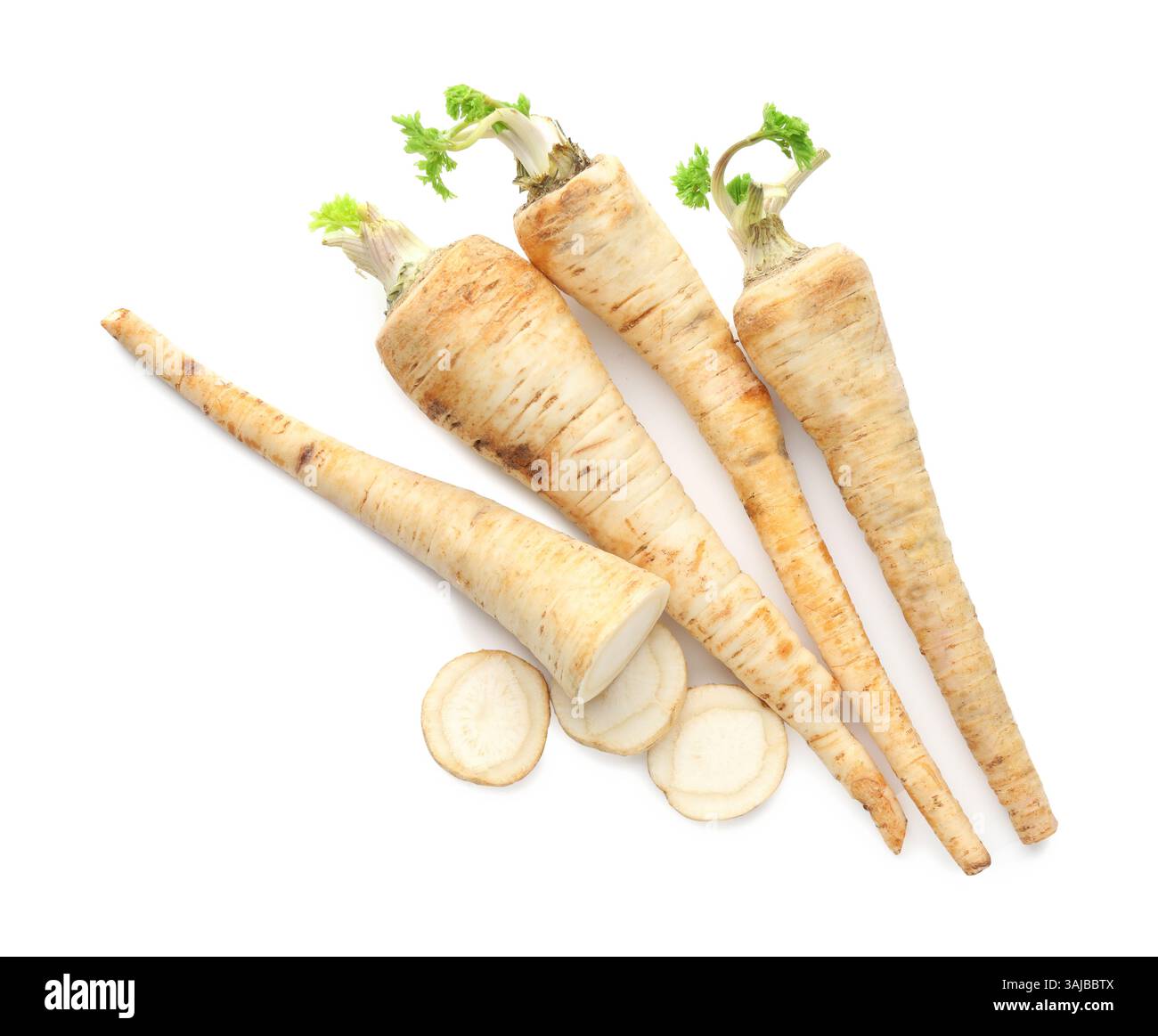 Whole and cut fresh parsley roots isolated on white, top view Stock ...