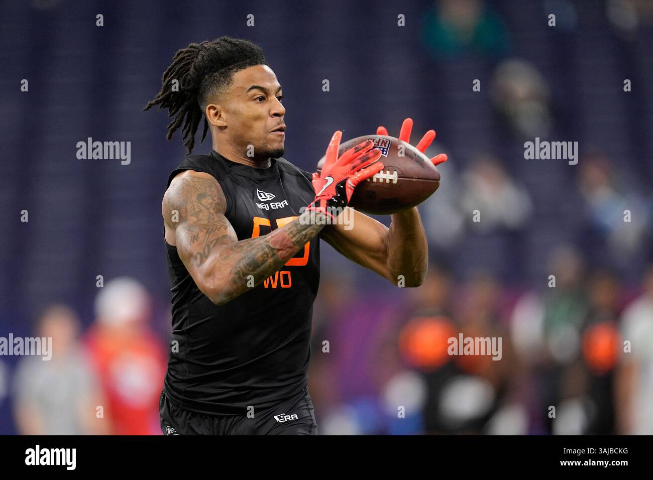 FILE - Texas wide receiver Isaiah Bond runs a drill at the NFL football ...