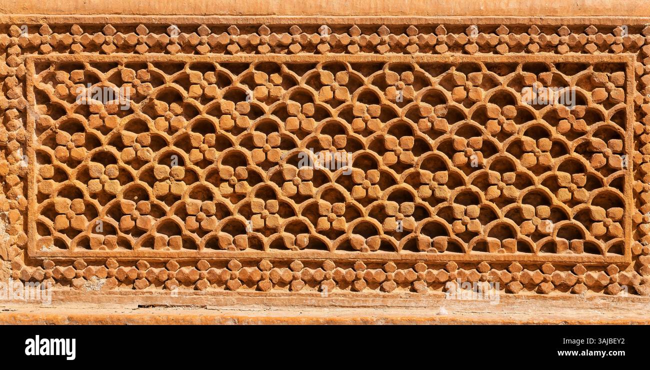Intricate sand stone traditional window grill on historic building in ...