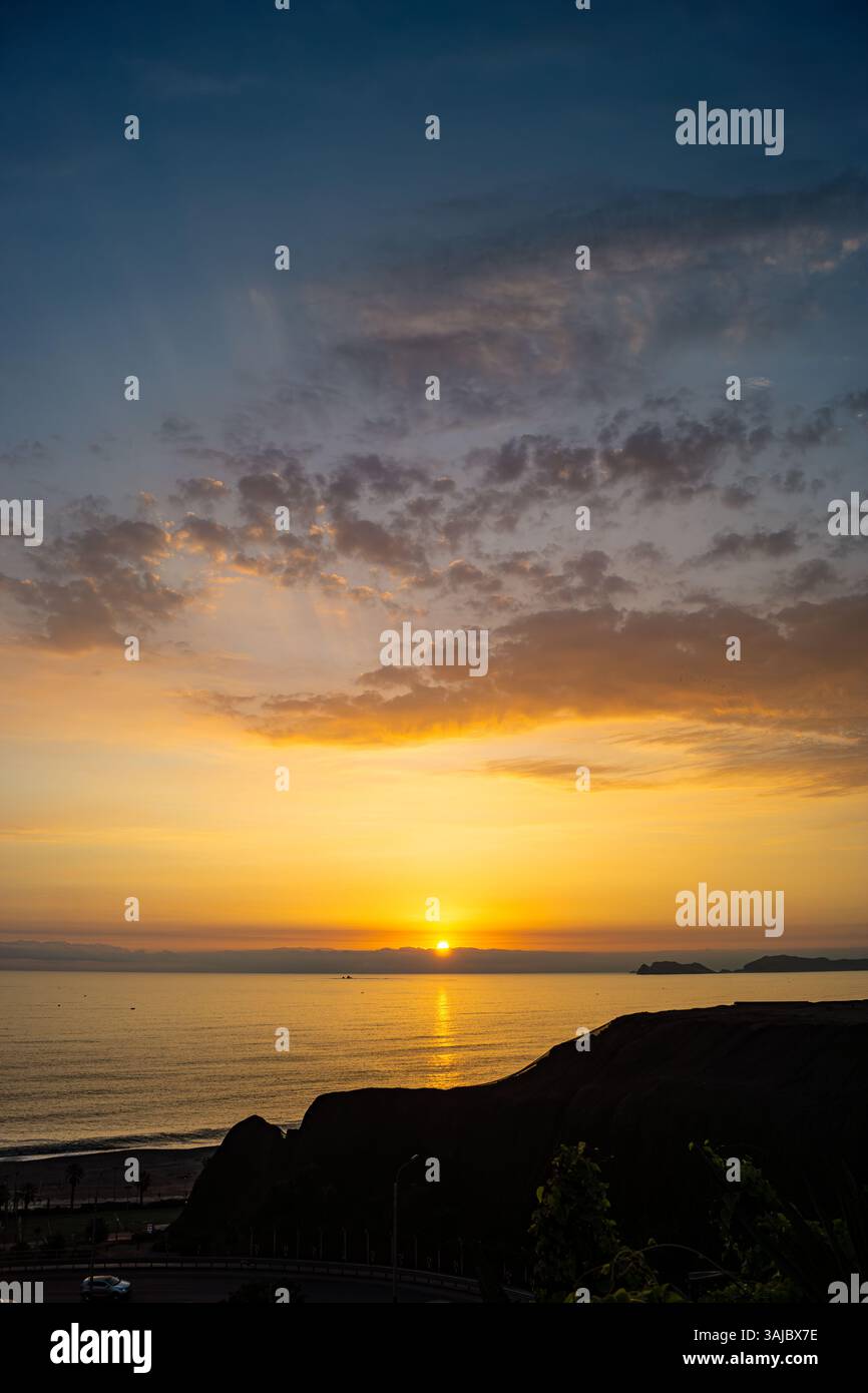 View of the Pacific Ocean at sunset from the coast of Lima, Peru Stock ...