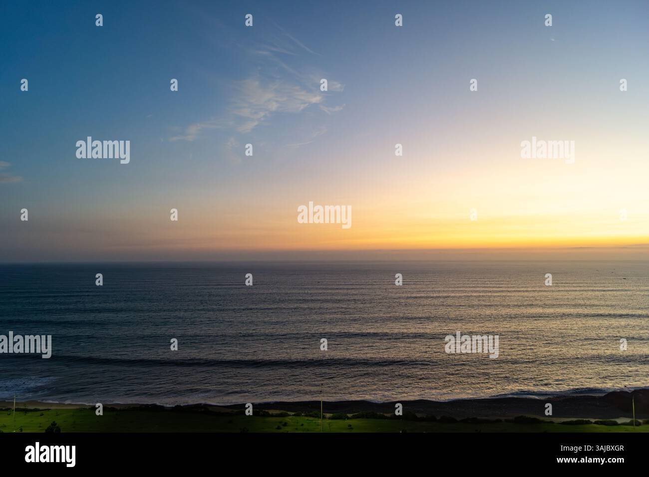 View of the Pacific Ocean at sunset from the coast of Lima, Peru Stock ...