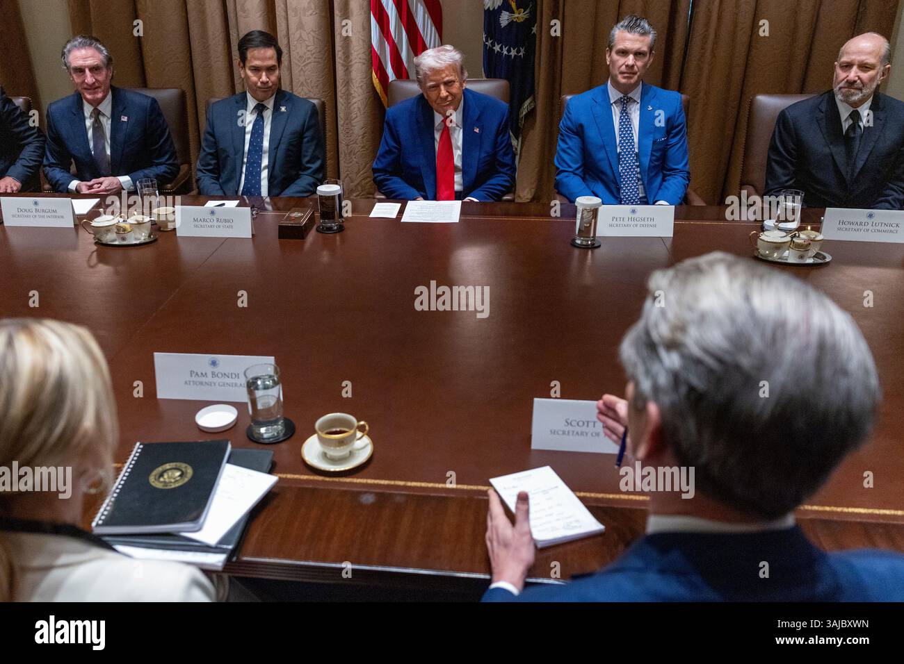United States President Donald J. Trump listens to remarks during a ...