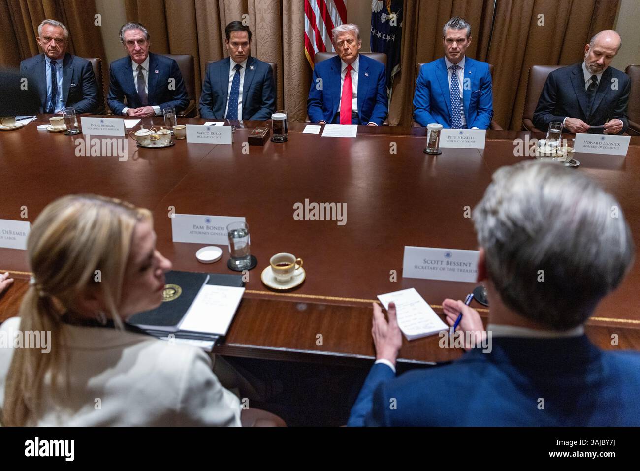 United States President Donald J. Trump listens to remarks during a ...