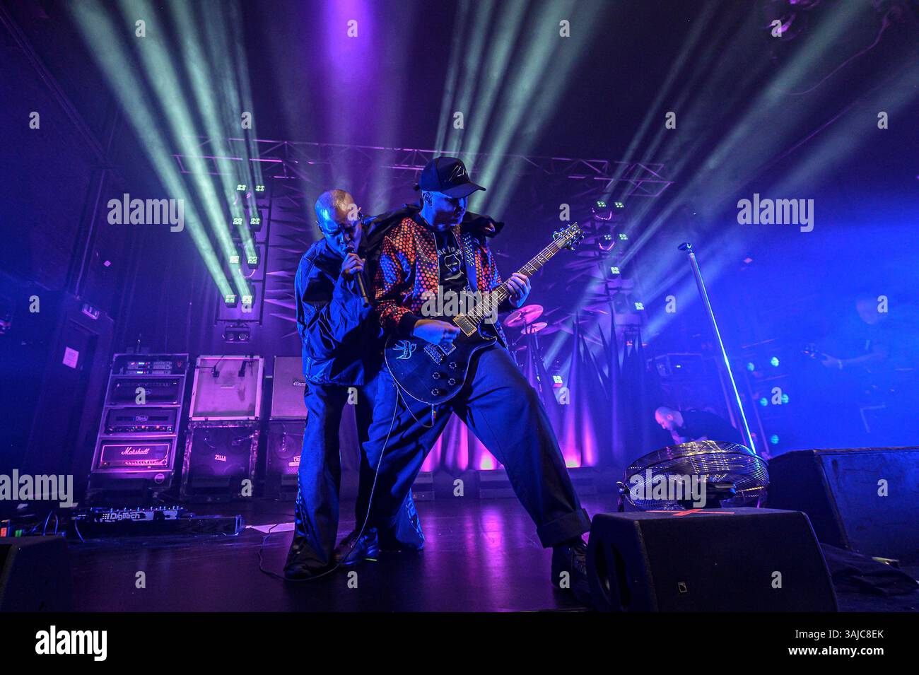 L-R Deborah "Skin" Dyer and Martin "Ace" Kent perform live on stage at ...