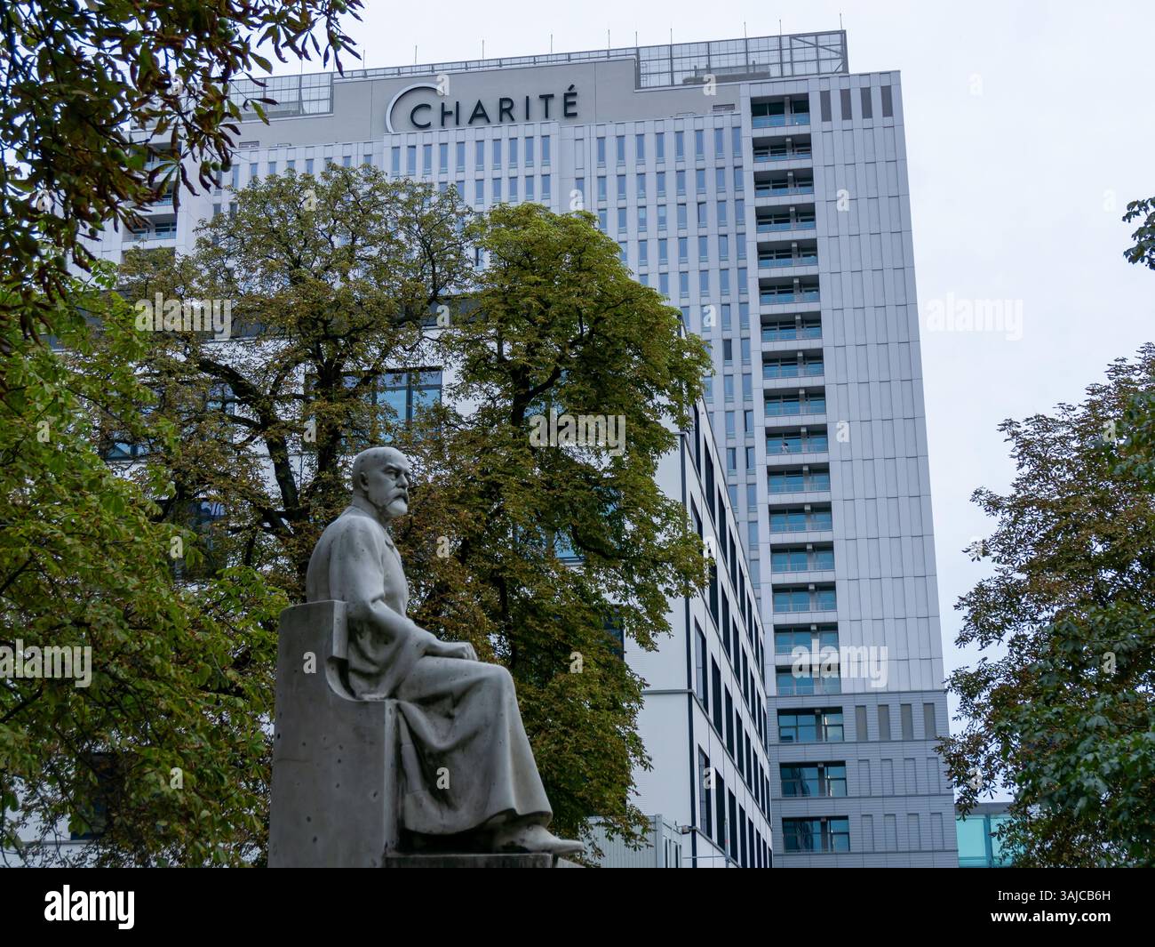 Statue of Robert Koch in front of the main building of Charité ...
