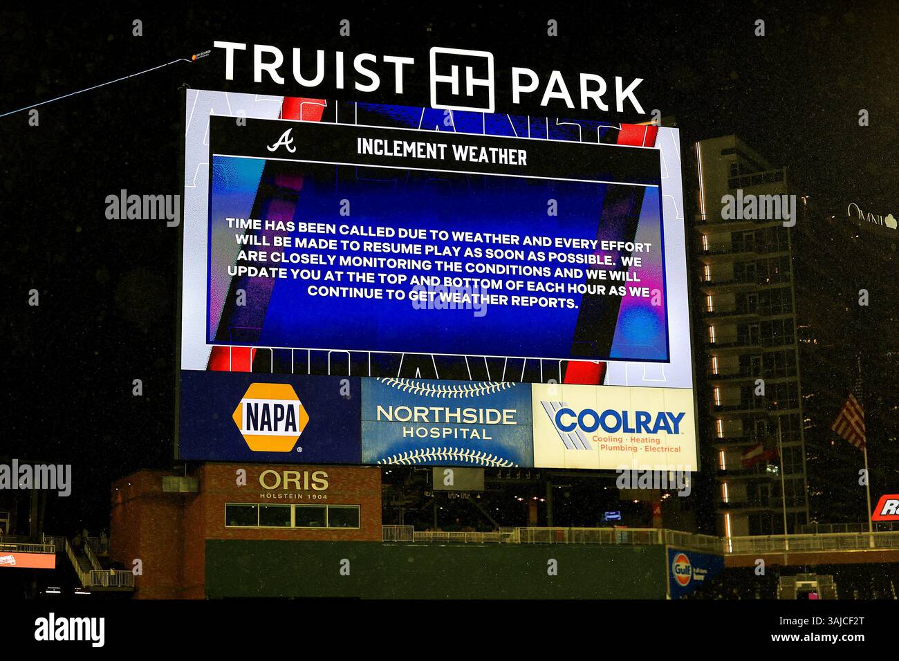 ATLANTA, GA - APRIL 10: The centerfield scoreboard displays the Weather ...
