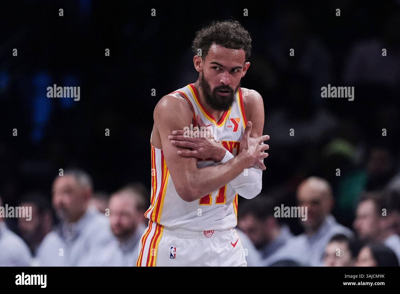 Atlanta Hawks' Trae Young (11) gestures after making a three-point shot ...