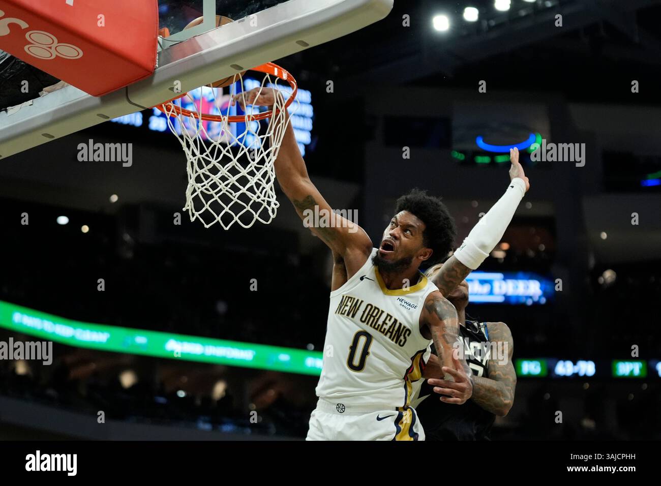 New Orleans Pelicans' Keion Brooks Jr. (0) misses a dunk against ...