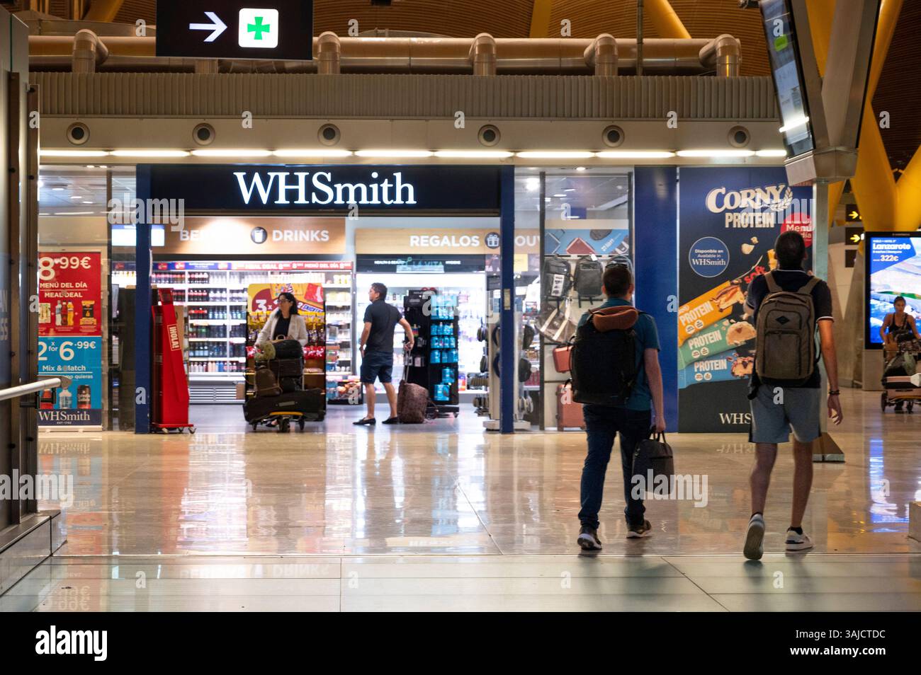 Flight passengers are seen shopping at the British retailer company WH ...