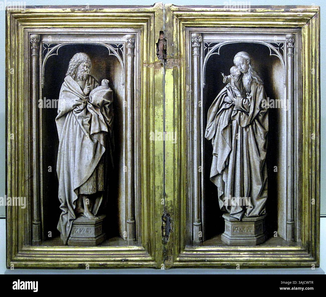 A grisaille diptych painting attributed to the Circle of Jan van Eyck, dated to the 15th century ...