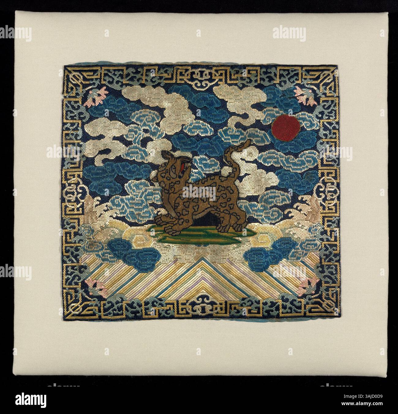 Embroidered silk military rank badge featuring a leopard, dating from ...