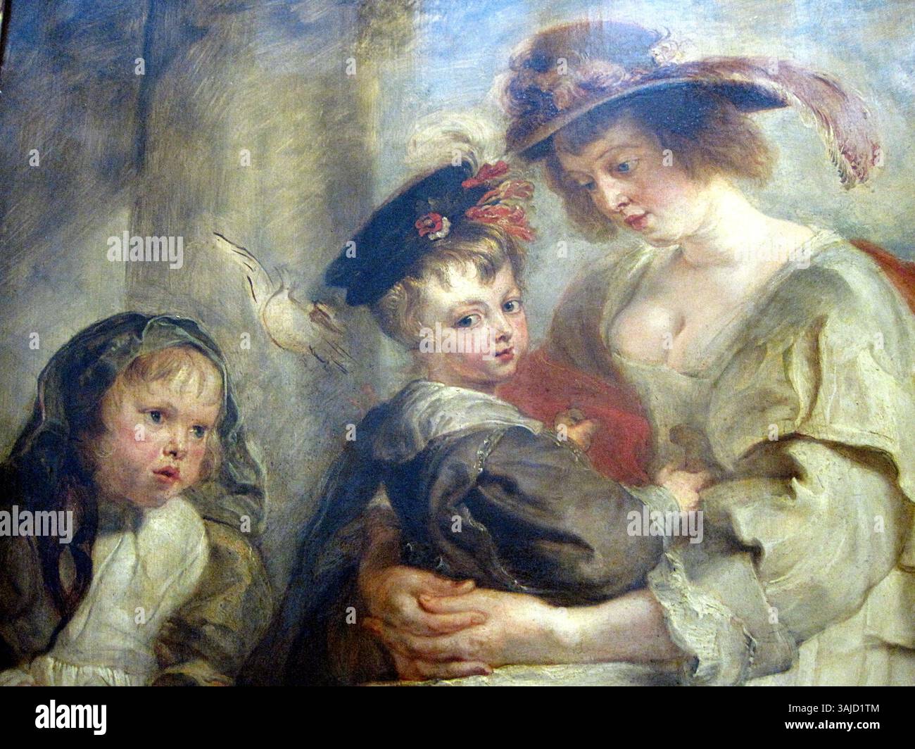 A portrait by Peter Paul Rubens, titled 'Hélène Fourment and her children,' painted circa 1636 ...