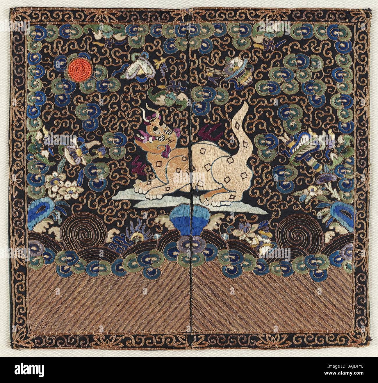 This embroidered military rank badge, featuring a leopard motif, dates ...