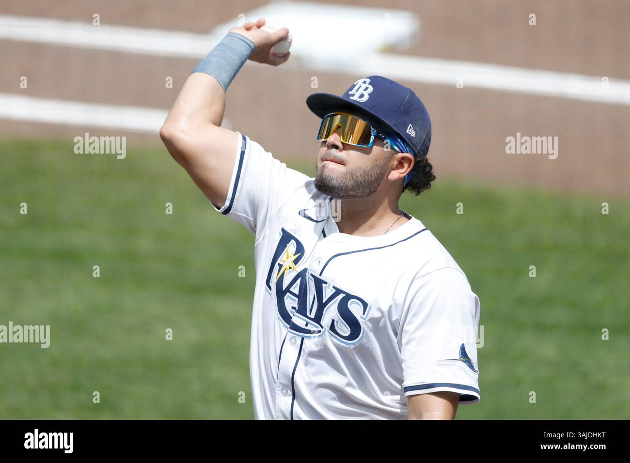 Tampa, FL USA: Tampa Bay Rays first base Jonathan Aranda (62) tosses a ...