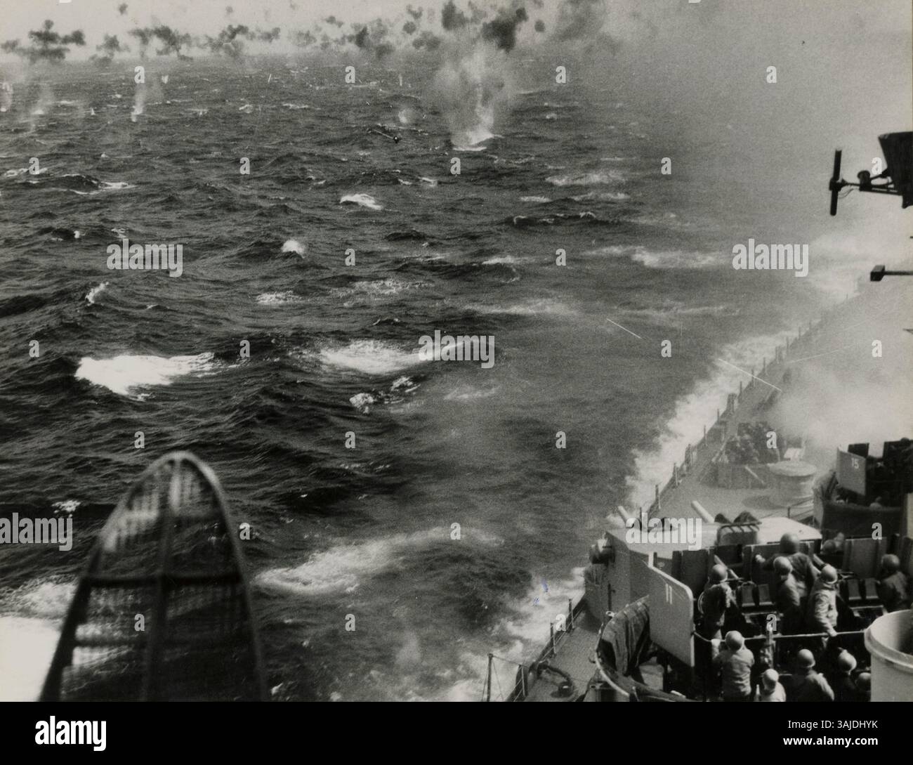 This image provided by the National Archives, shows anti-aircraft fire ...