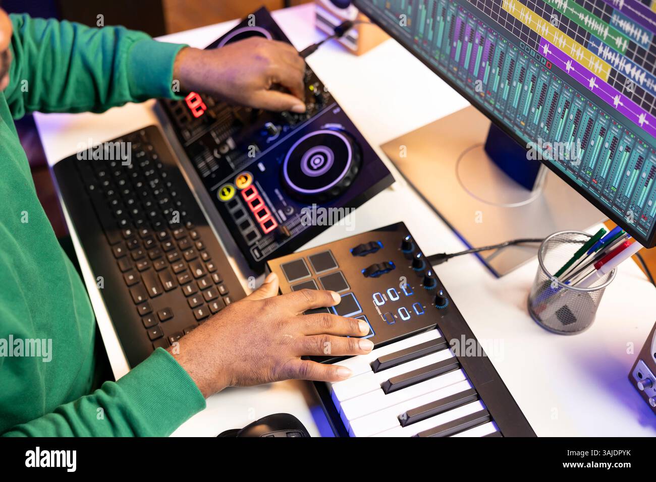 Sound engineer artist adding effects on his audio files in post ...