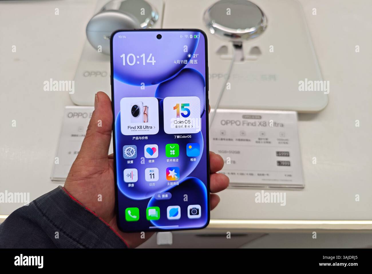 SHANGHAI, CHINA - APRIL 11, 2025 - A customer experiences OPPO's newly ...