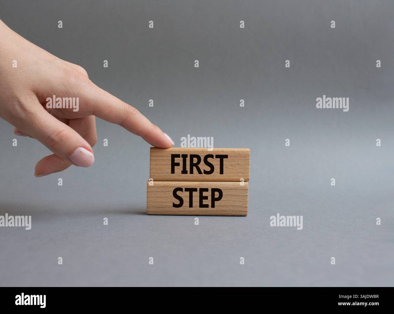 First step symbol. Wooden blocks with words 'First step'. Beautiful ...