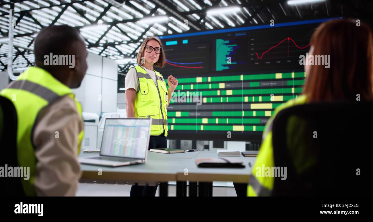 African American Woman Leading Diverse Team In Semiconductor Plant ...