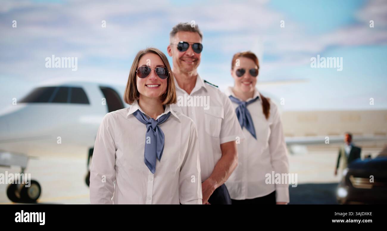 , A Happy Group Of Flight Attendants And Pilot Pose Near A Private Jet ...