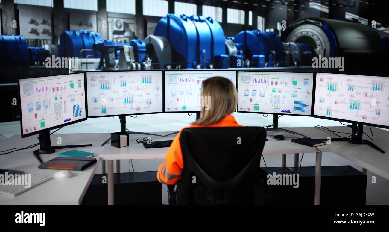 Female Engineer Monitoring Power Plant's Electricity Generation With ...