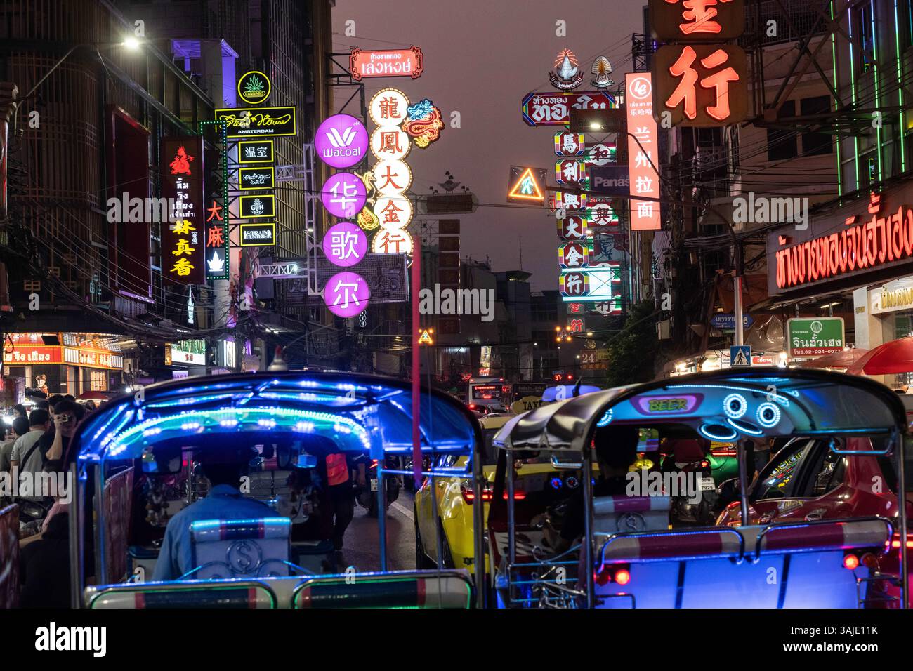 Bangkok, Thailand. 26th Mar, 2025. Tuk Tuks and busy traffic in the chaotic streets of Bangkok's ...