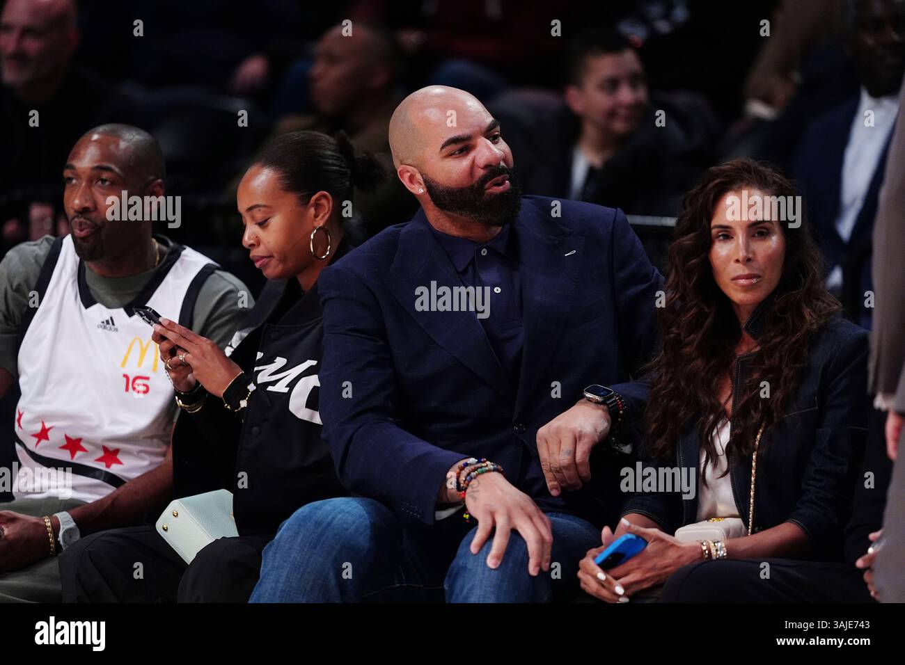 BROOKLYN, NY - APRIL 01: From left to right former NBA players Gilbert ...