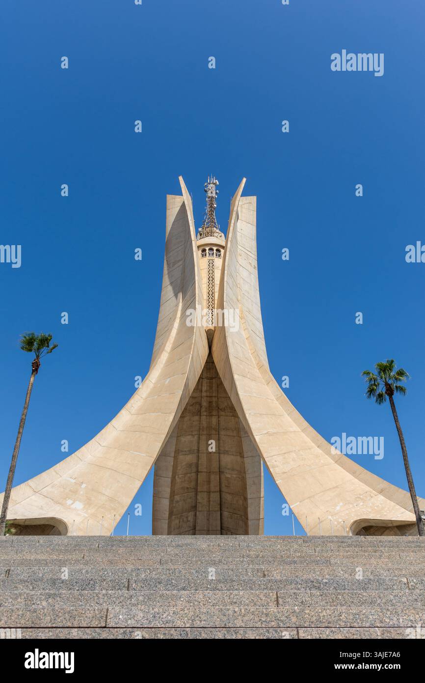 A group of people in Maqam Echahid Monument Square in Algiers City ...