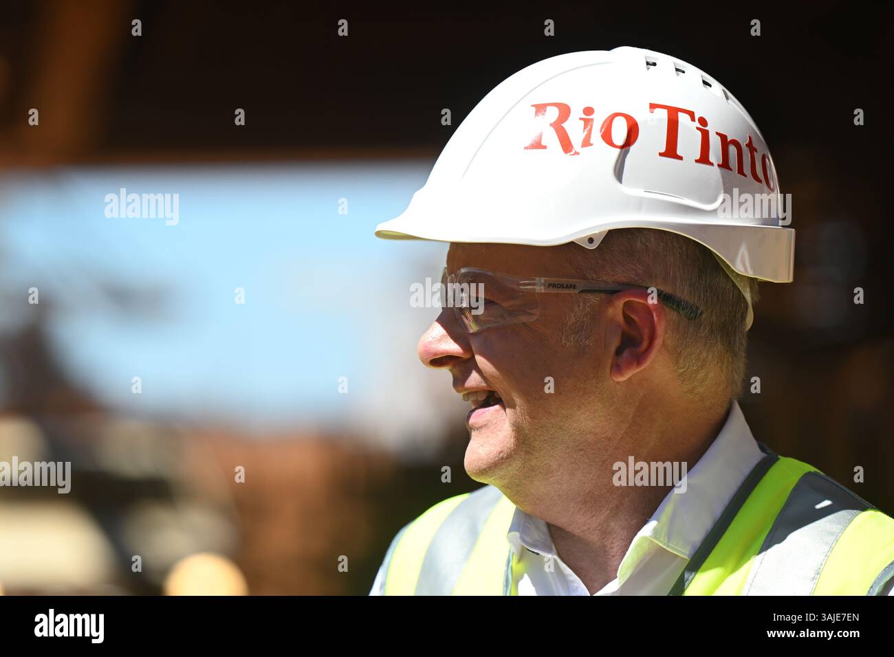 Australian Prime Minister Anthony Albanese wears a hard hat as he ...