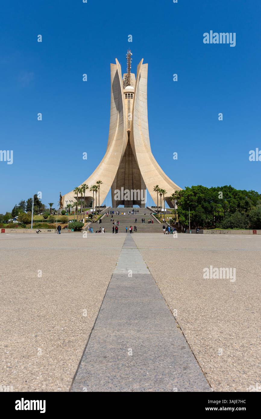 A group of people in Maqam Echahid Monument Square in Algiers City ...