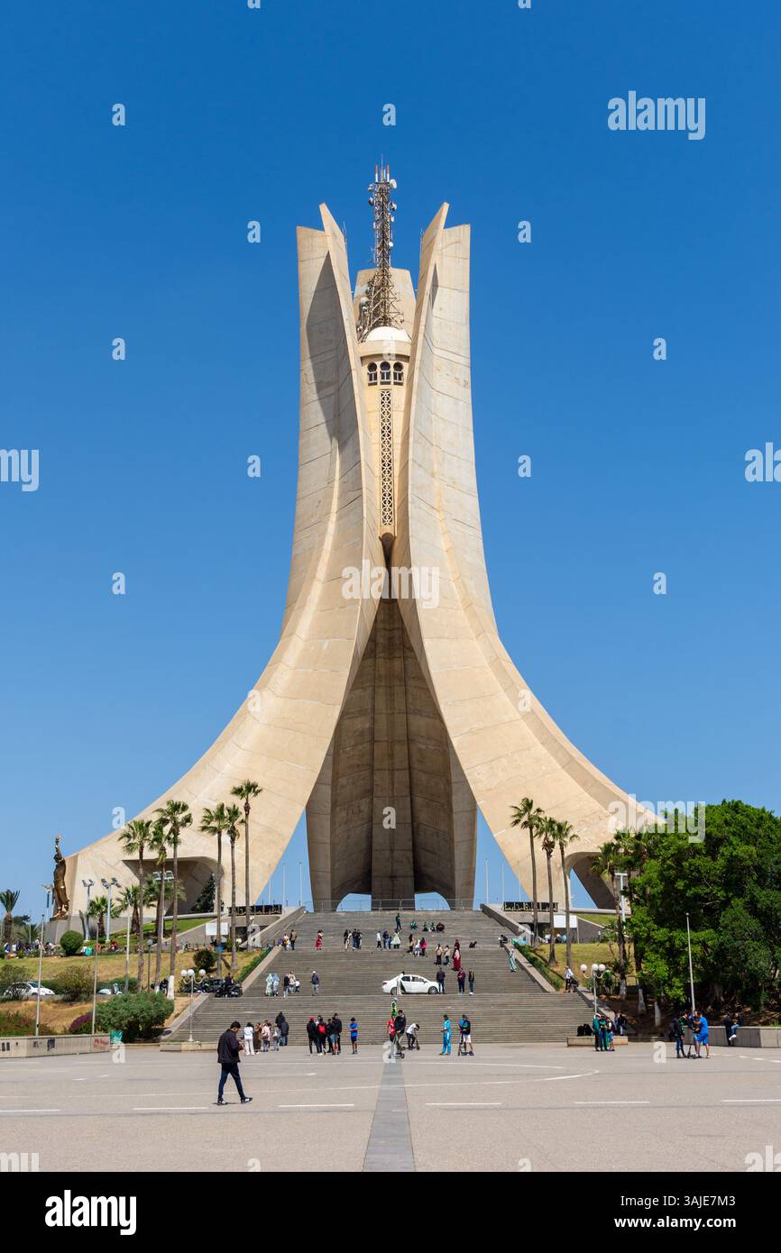 A group of people in Maqam Echahid Monument Square in Algiers City ...